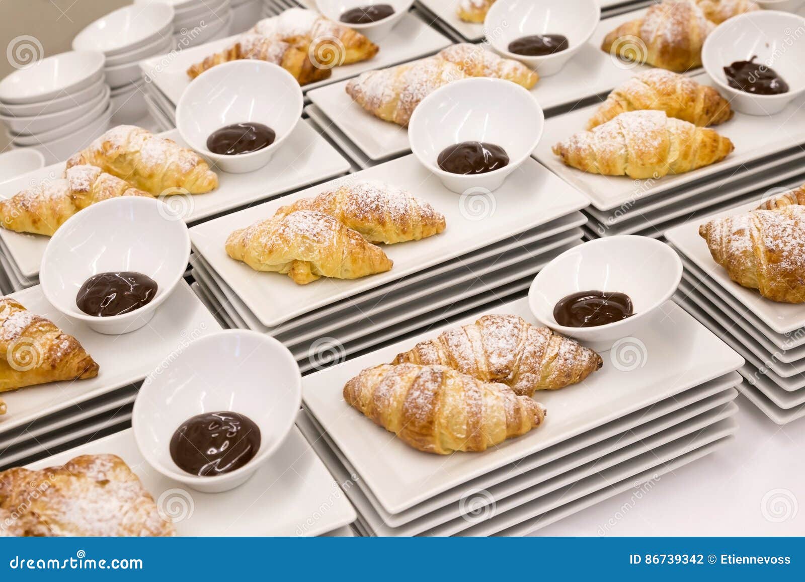Modern White Plates with Plain Croissants with Chocolate Sauce. Stock ...