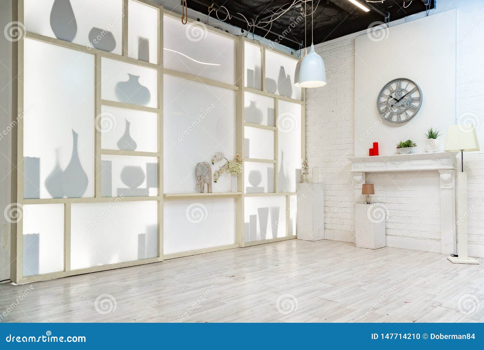 Modern White Studio. with a Light Stand in the Middle, with a Special ...