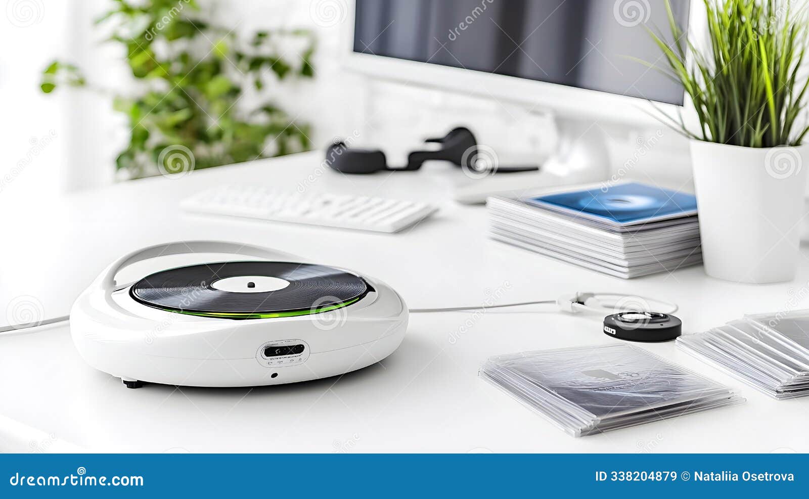 Modern White Workspace with a Vinyl Record Player, Stacks of CDs ...