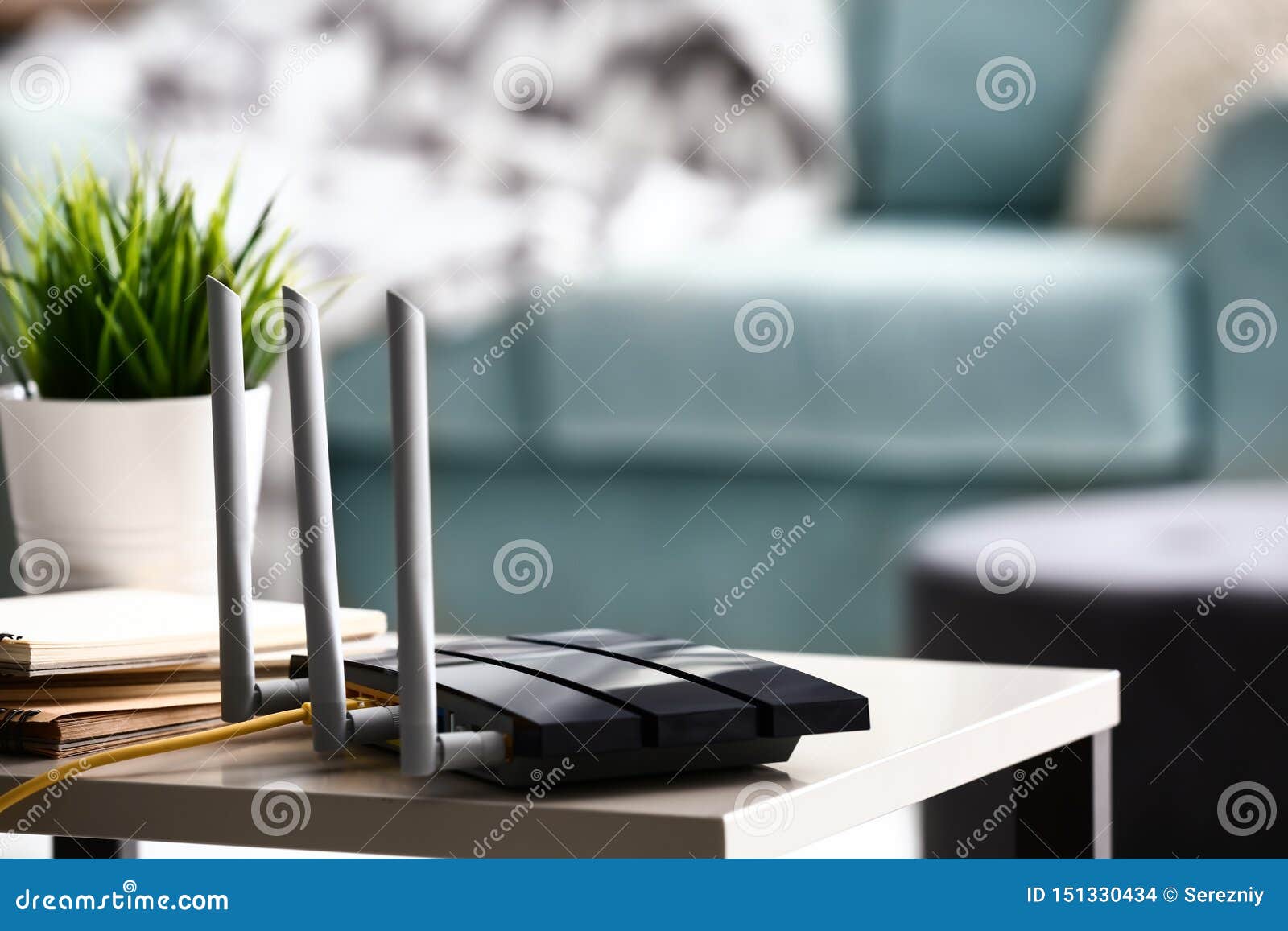 Modern Wi-fi Router on Light Table in Room Stock Photo - Image of ...