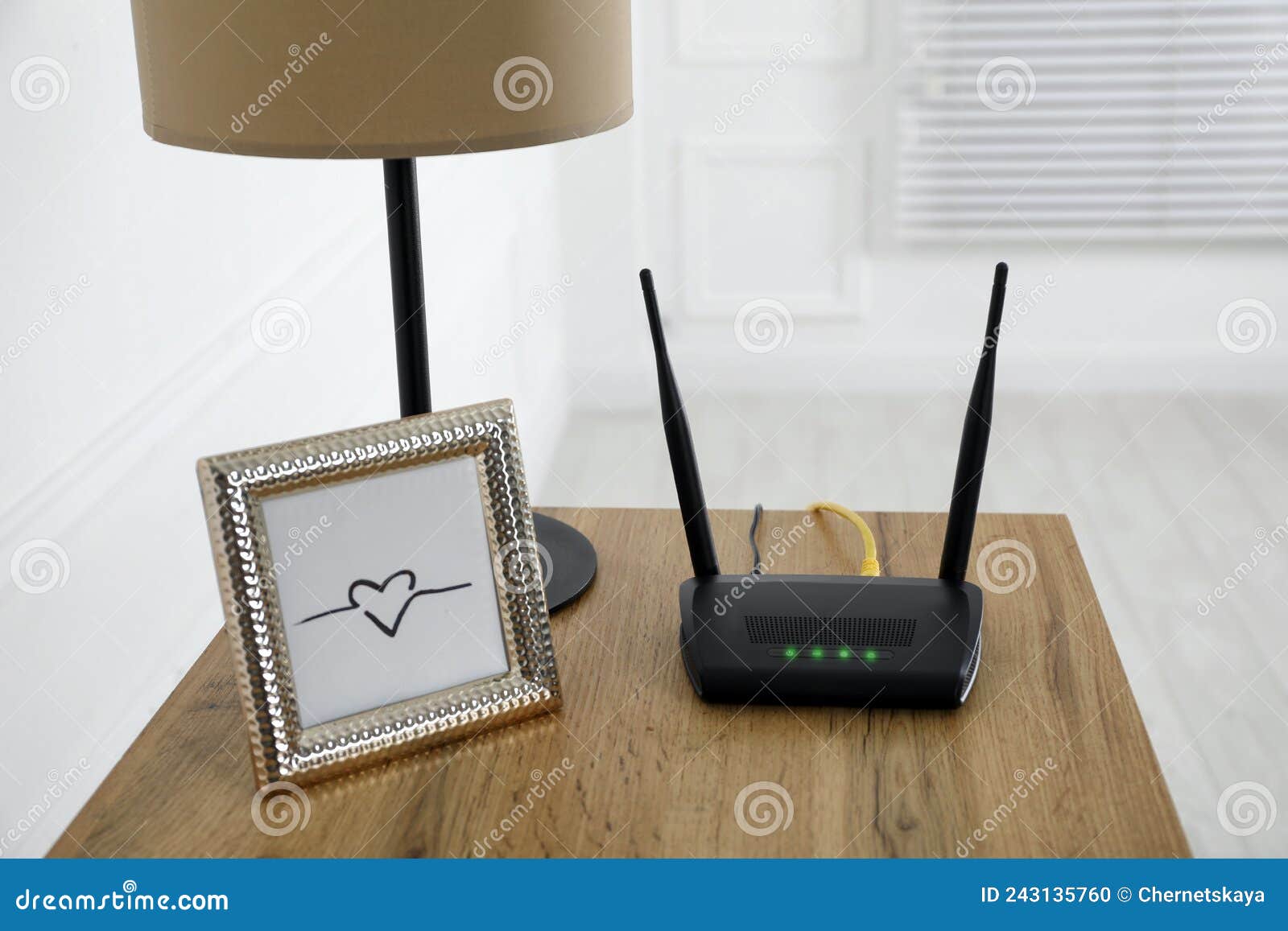 Modern Wi-Fi Router on Wooden Table in Room Stock Photo - Image of ...