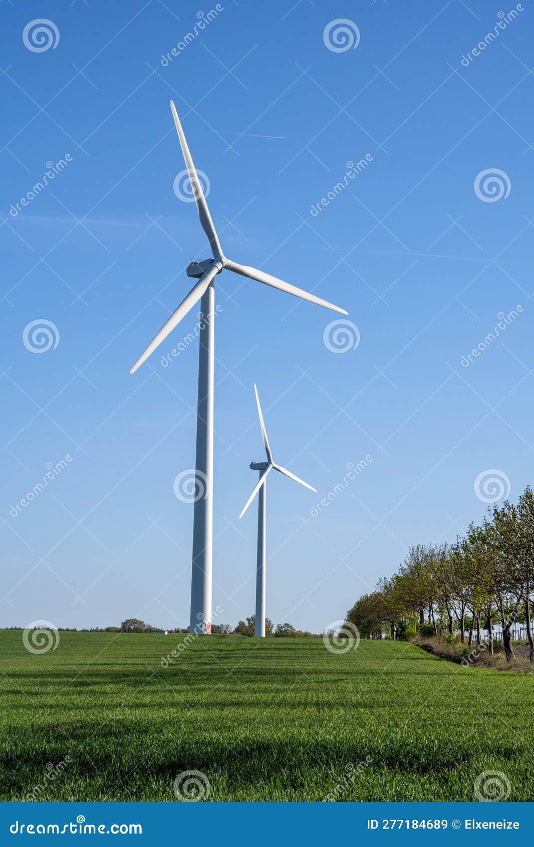 Modern Wind Turbines in Front of a Blue Sky Stock Image - Image of ...