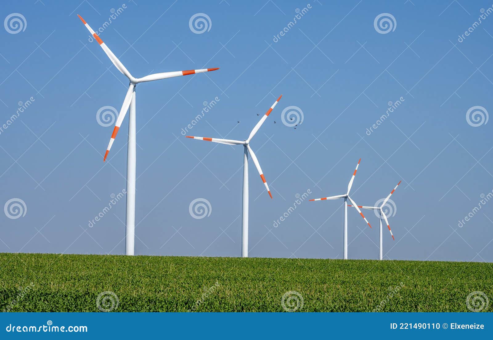Modern Wind Turbines in a Grainfield Stock Photo - Image of germany ...