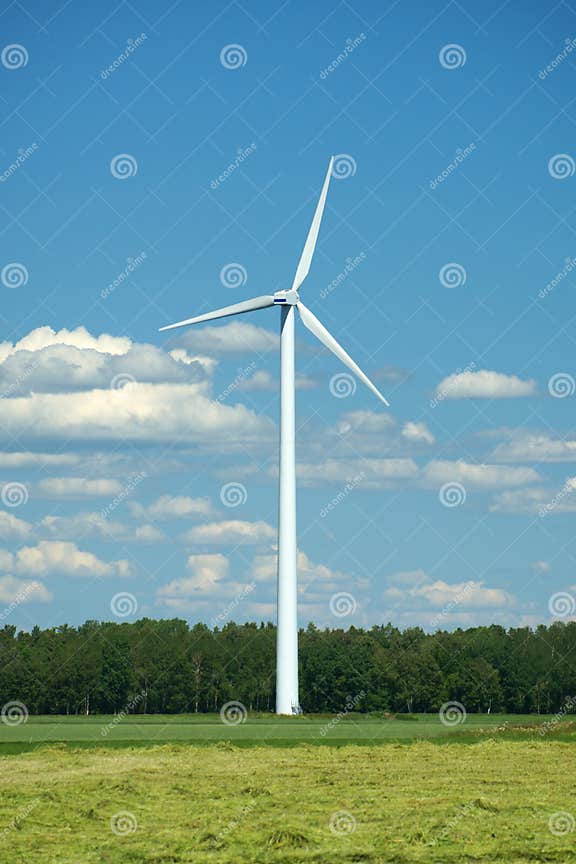 Modern windmill on field stock photo. Image of blue, field - 9993348