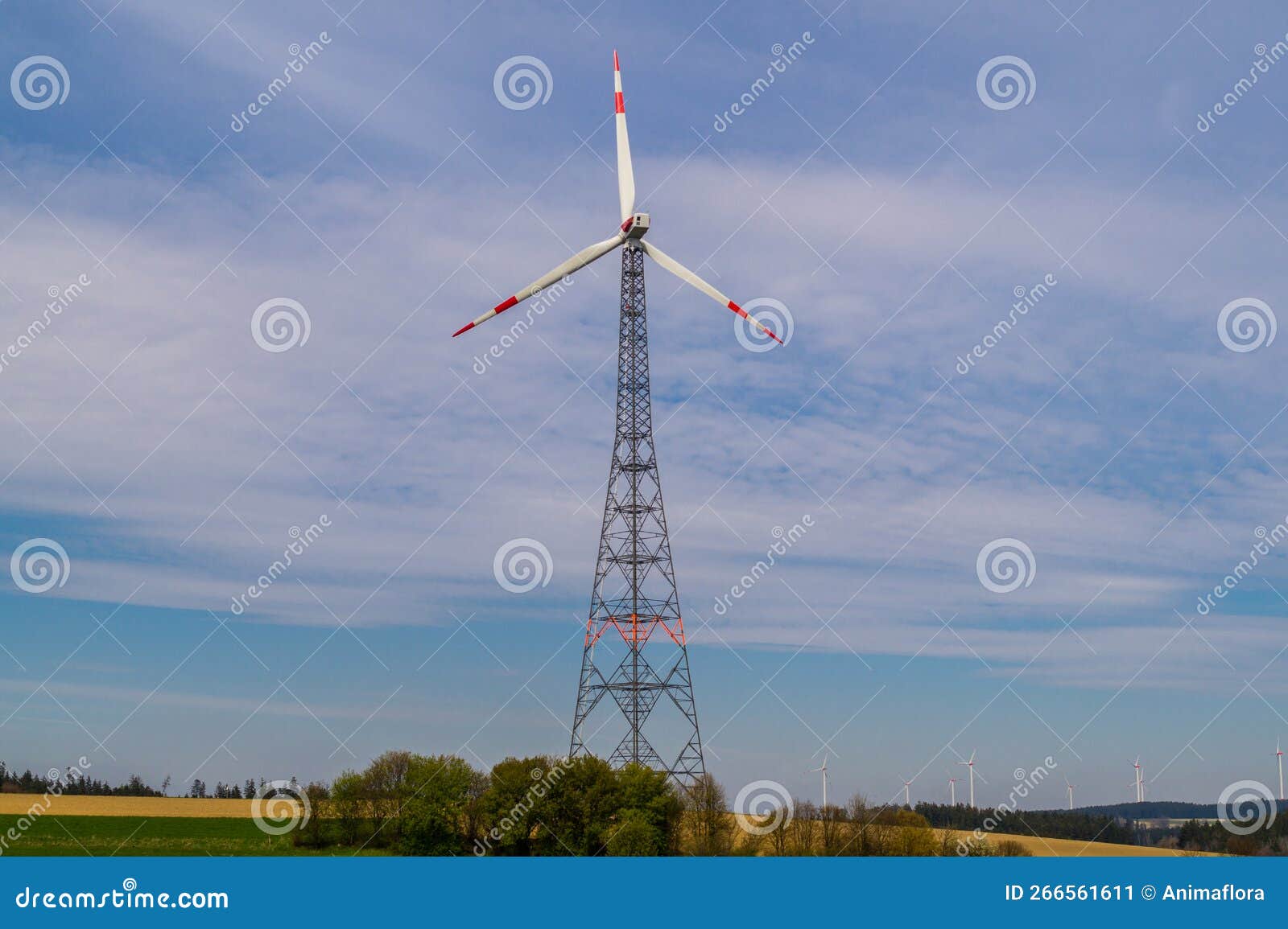Modern windmill on a field stock image. Image of people - 266561611