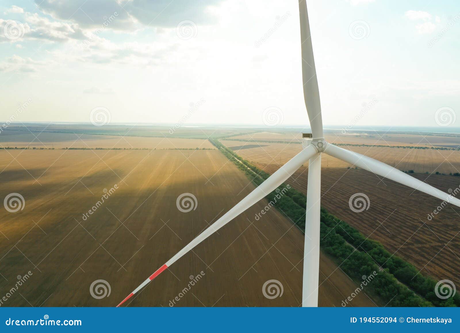Windmill in Field, Space for Text. Energy Efficiency Stock Photo ...
