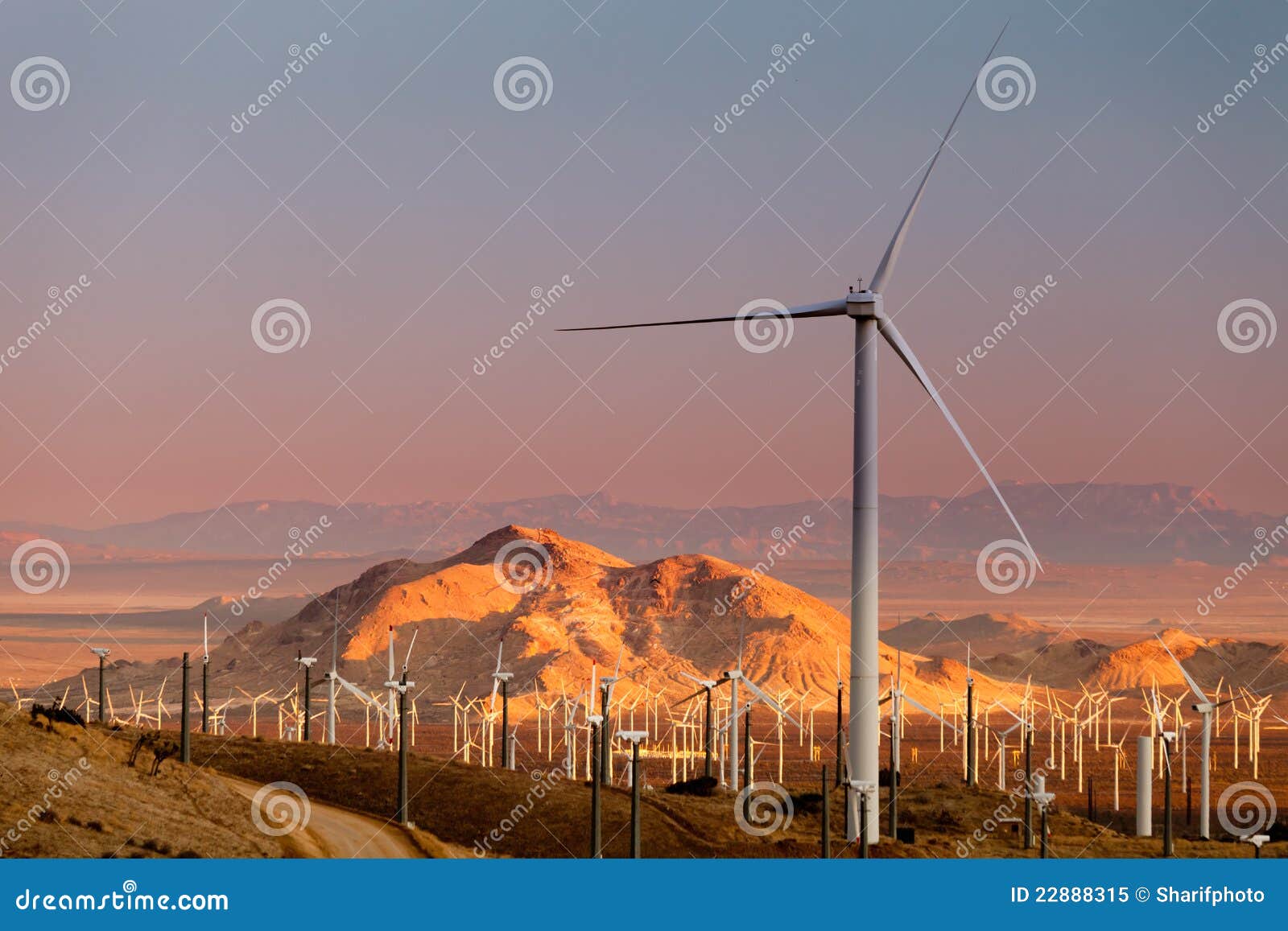Modern windmills in sunset stock image. Image of environment - 22888315
