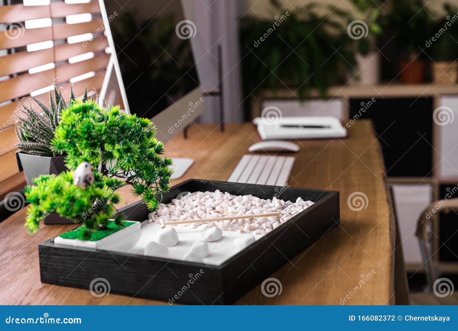 Modern Workplace with Miniature Zen Garden and Computer in Room Stock ...