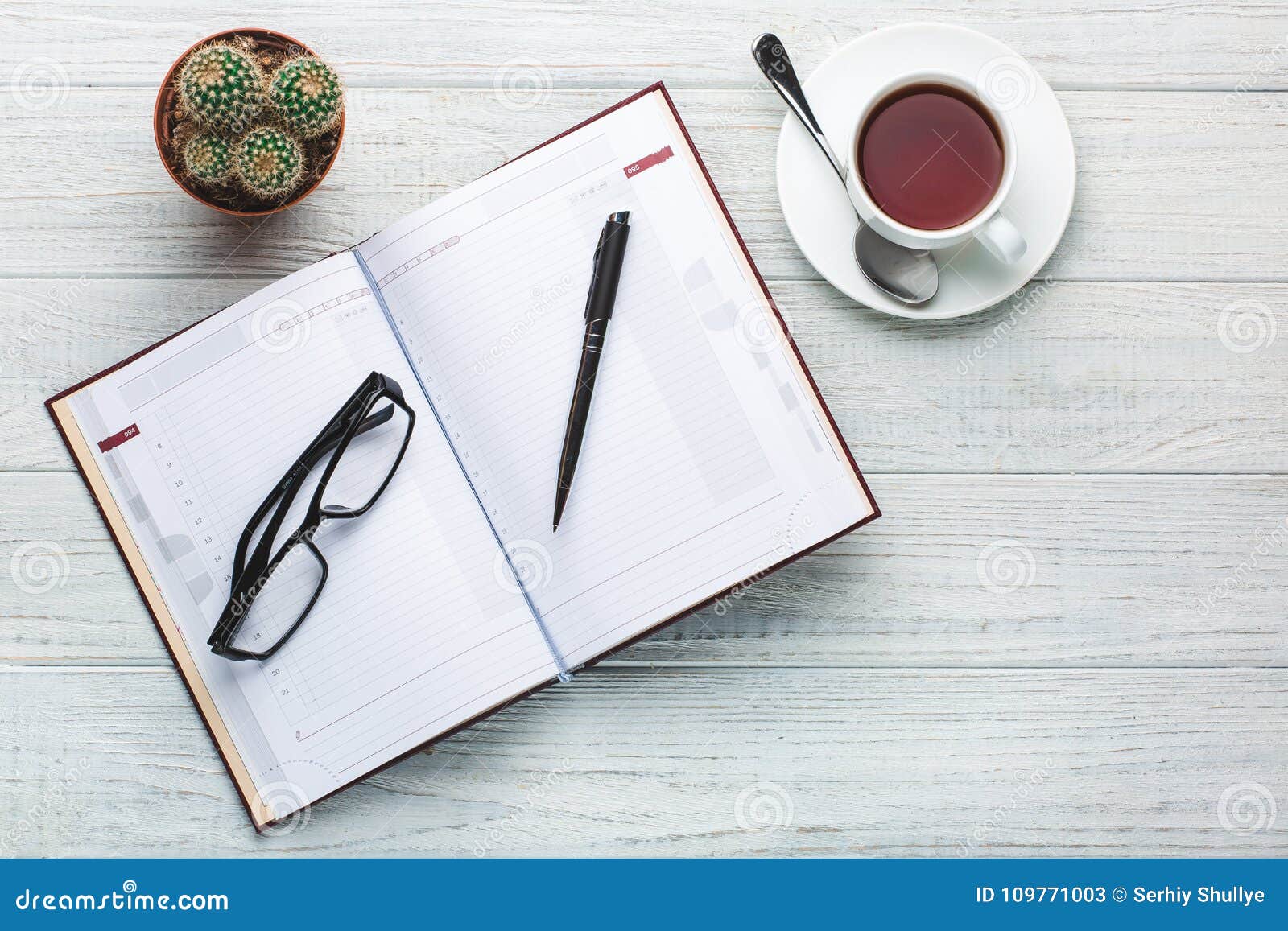 Modern Workplace. Notebook on Wooden Table with a Lot of Things Stock ...