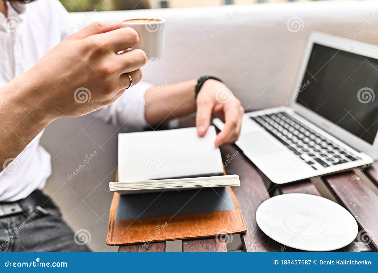Modern Workplace at a Table in a Cafe with Coffee and Laptop Stock ...