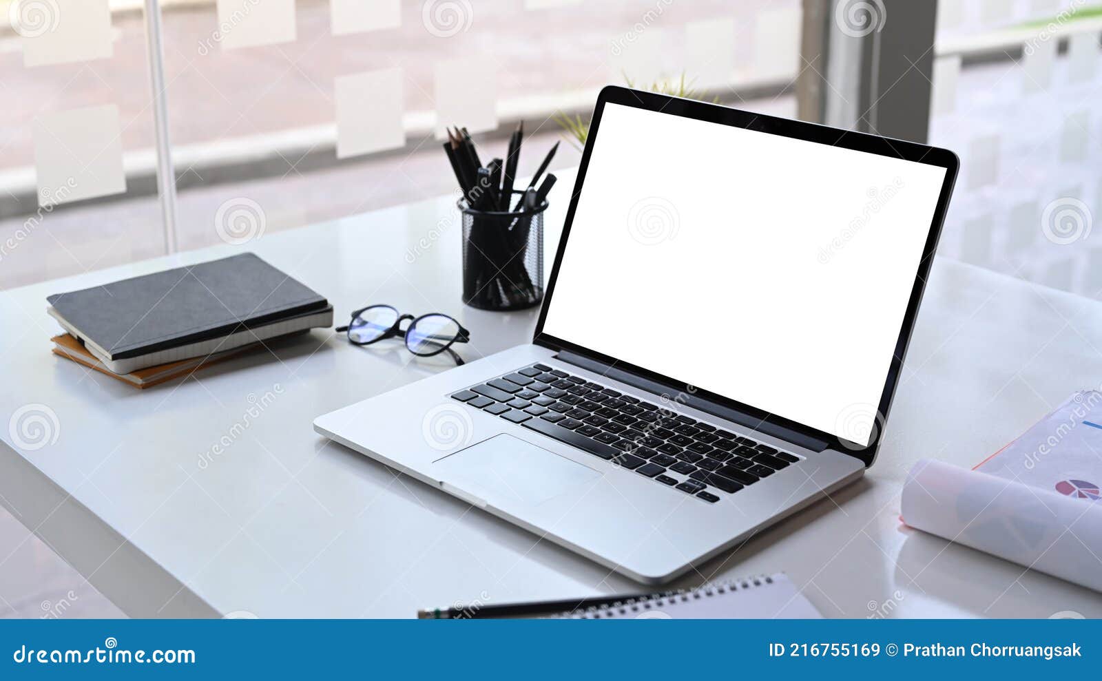 Modern Workspace with Laptop, Pencil Holder, Document, Glasses and ...