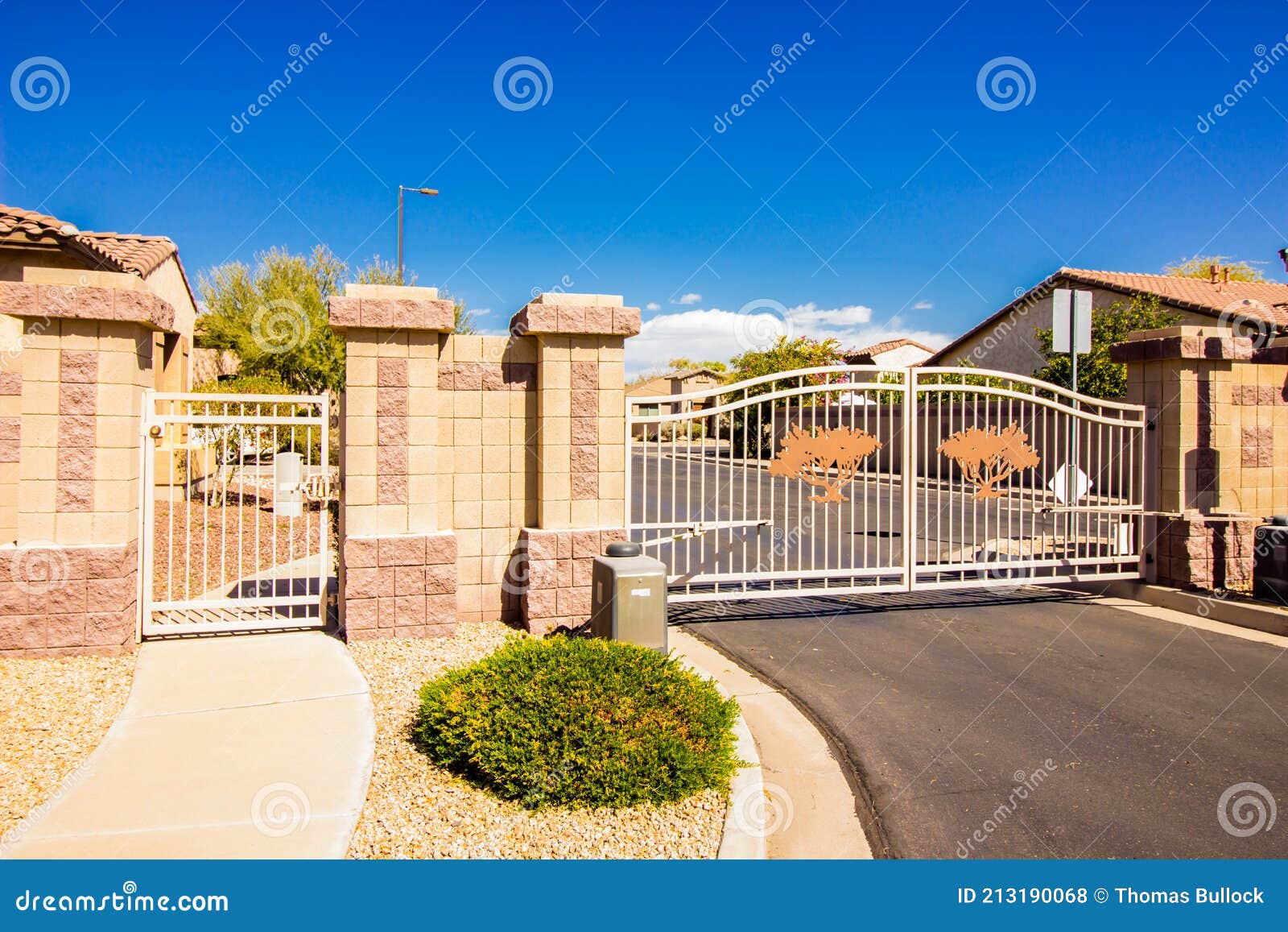 Modern Wrought Iron Electric Exit Gate Stock Photo - Image of blocks ...