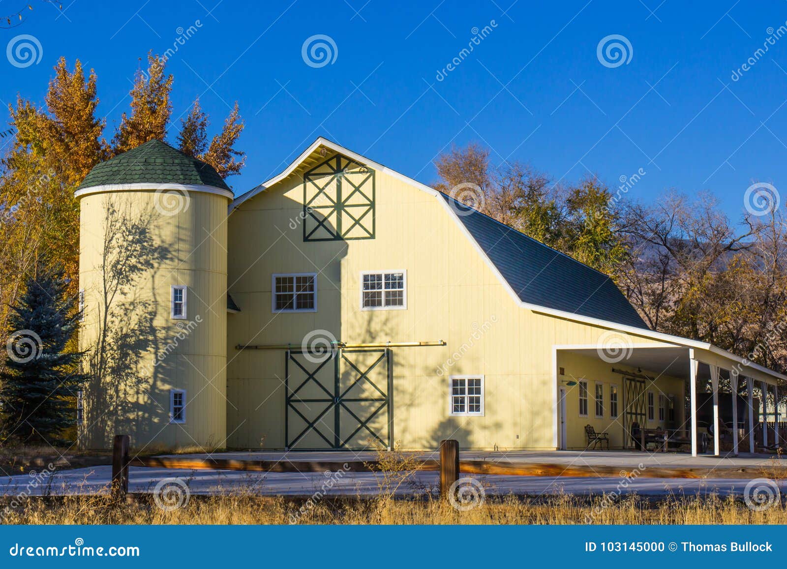 Modern Yellow Barn with Overhang Stock Photo - Image of shade, building ...