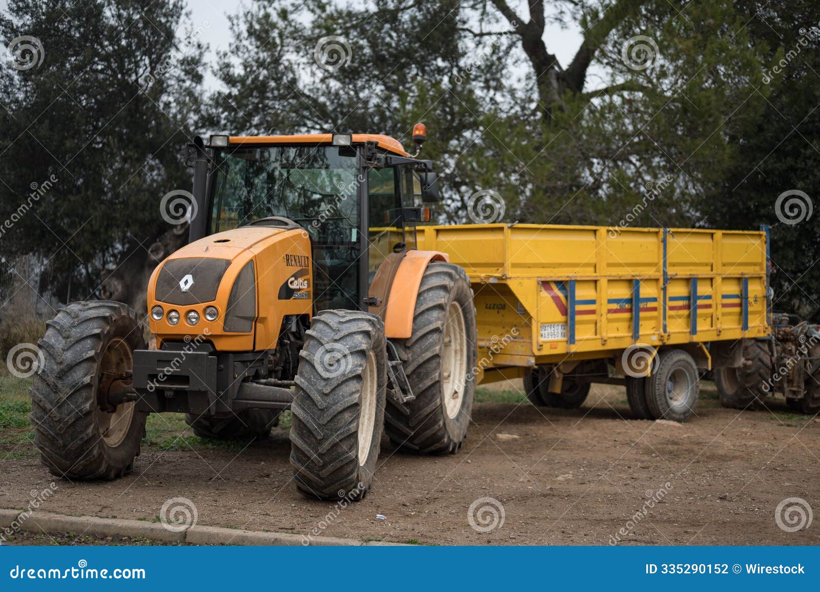 Modern Yellow Renault Celtis 456 RX Tractor with a Large Trailer ...