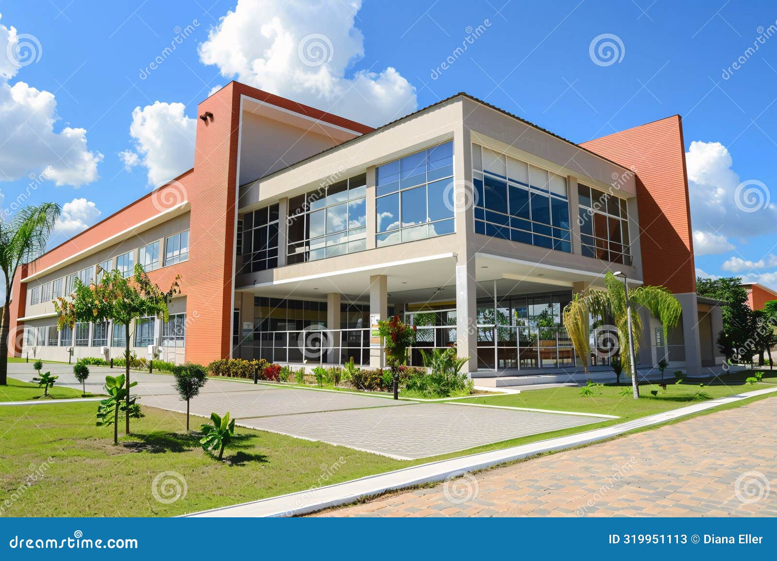 Modern Yellow School Building with Green Grass and Sky Stock ...
