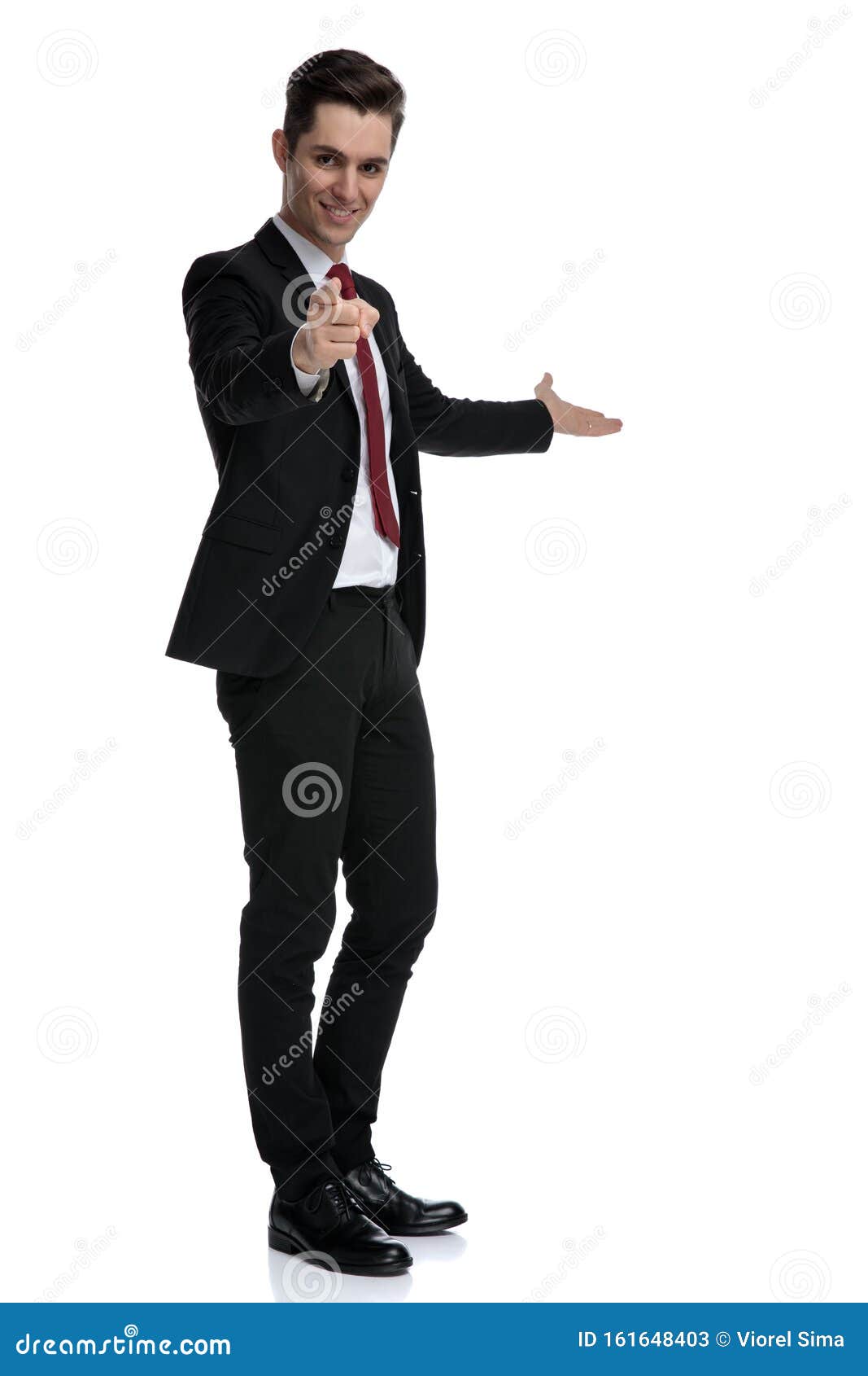 Modern Young Businessman Presenting and Pointing Forward Stock Image ... Modern Young Businessman Presenting and Pointing Forward Stock Image ...