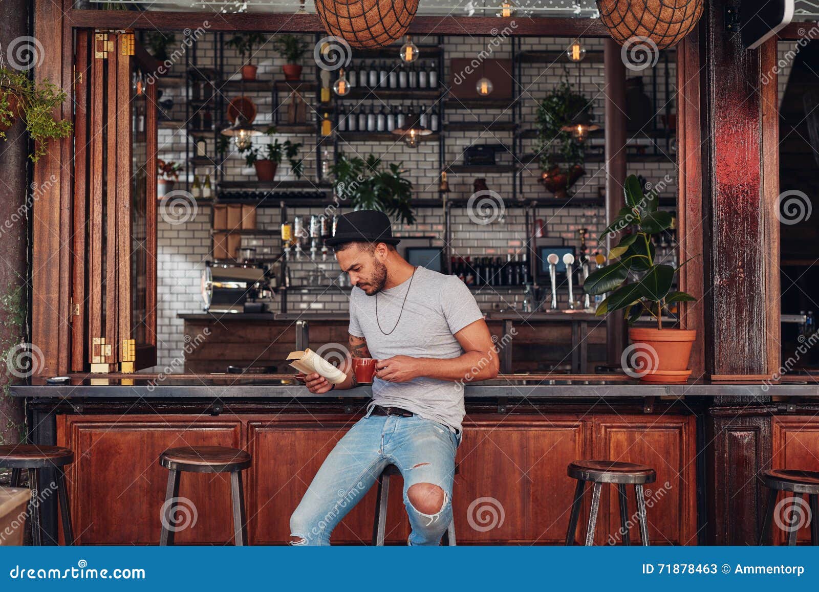 1,229 Man Sitting Cafe Reading Book Stock Photos - Free & Royalty-Free ...