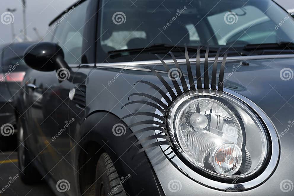 Modified Headlights of a Mini with Fake Eyelashes Stock Photo - Image ...