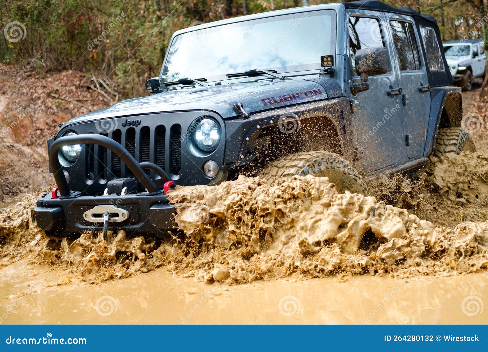 Modified Jeep Rubicon JK Driving through Mud. Editorial Photography ...
