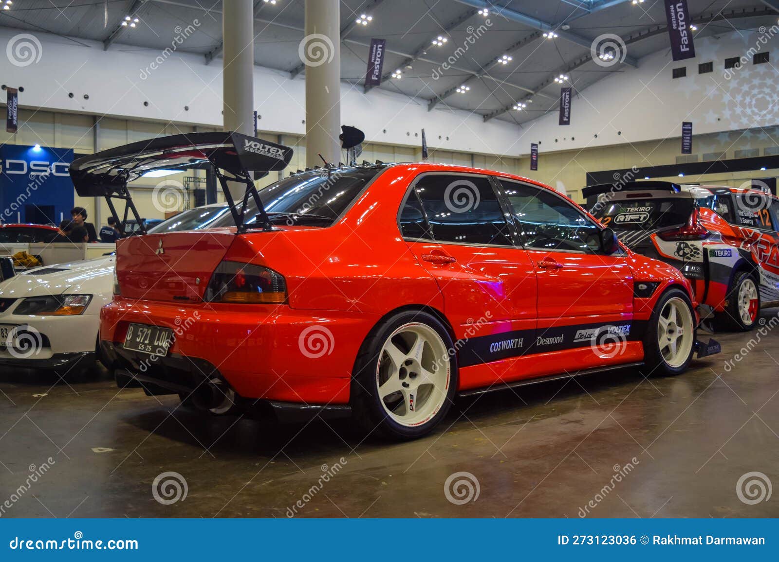 Modified Red Mitsubishi Lancer Evolution VIII Sedan on Display at the ...