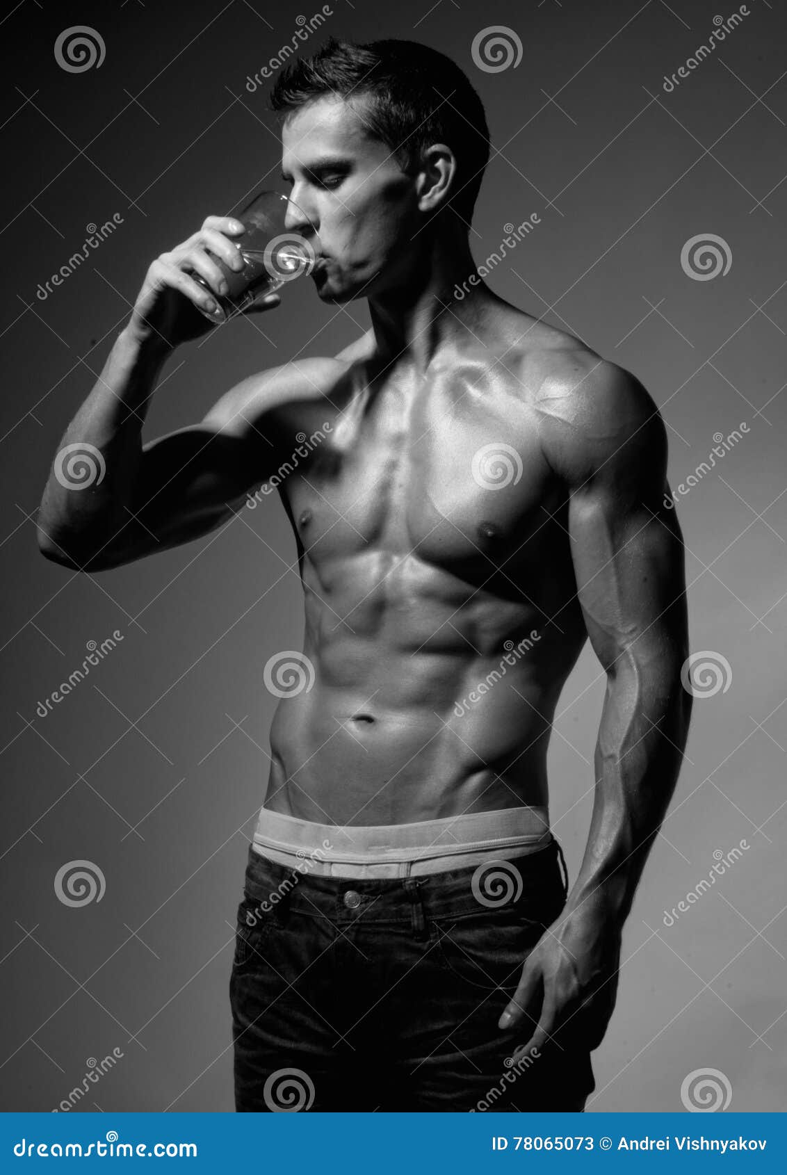 Modle with a glass stock image. Image of muscle, drinking - 78065073