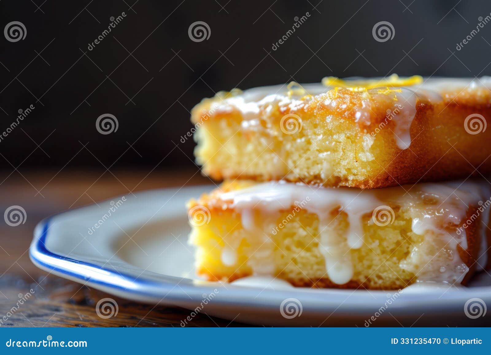A Moist Slice of Lemon Drizzle Cake with a Light Icing, Served on a ...
