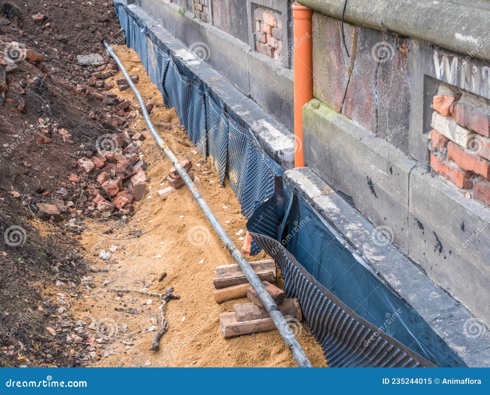 Moisture Protection on a House Stock Image - Image of bitumen ...