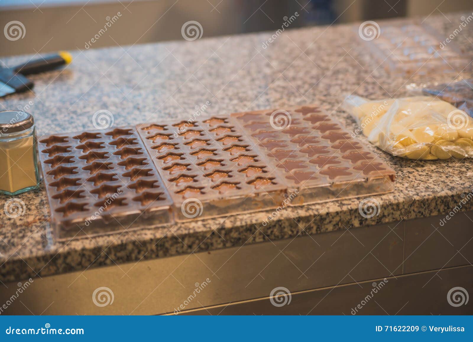Mold filled with chocolate stock image. Image of facility - 71622209