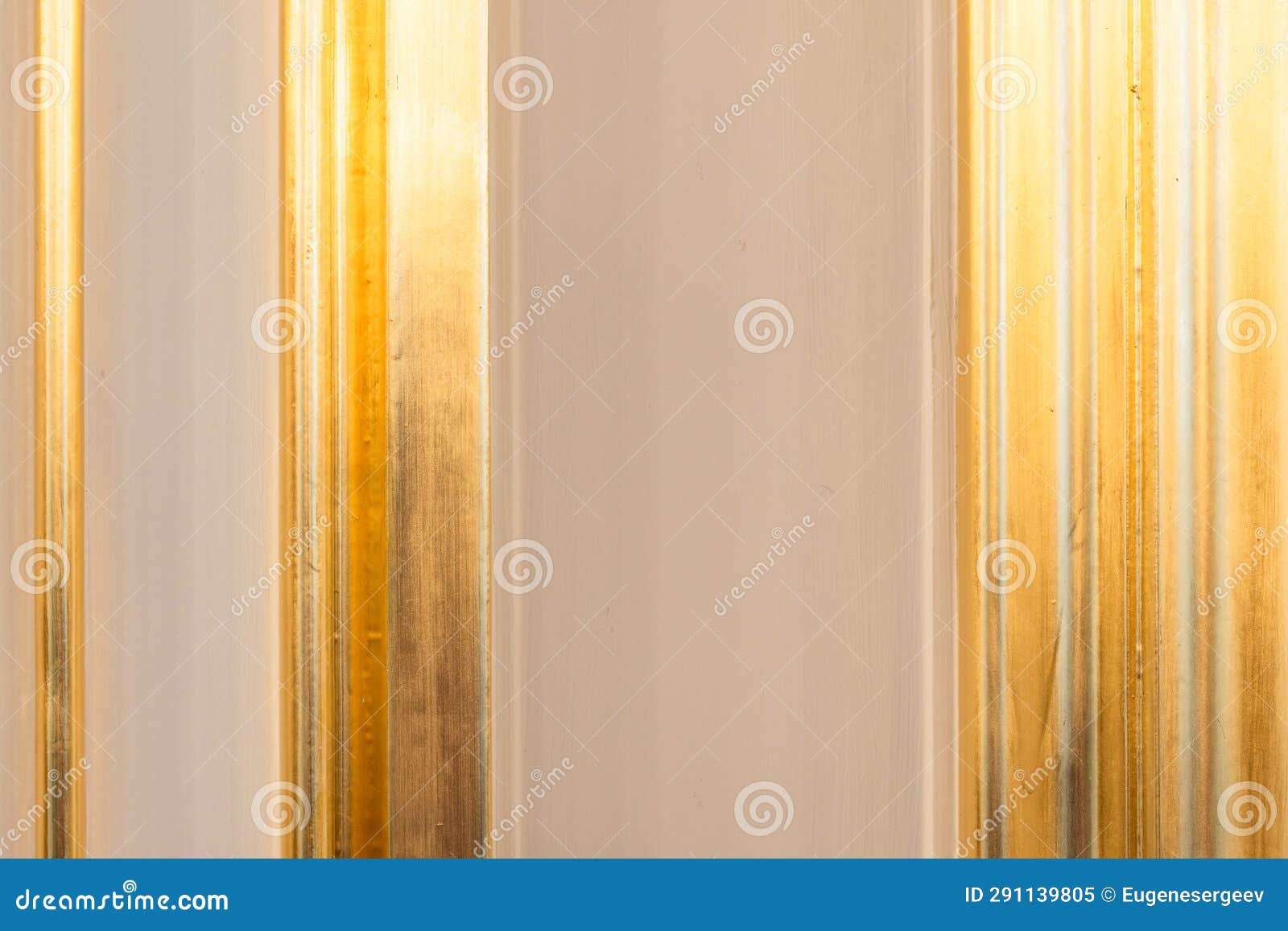 Molded Wall Decoration with Vertical Gold Colored Elements Stock Image ...
