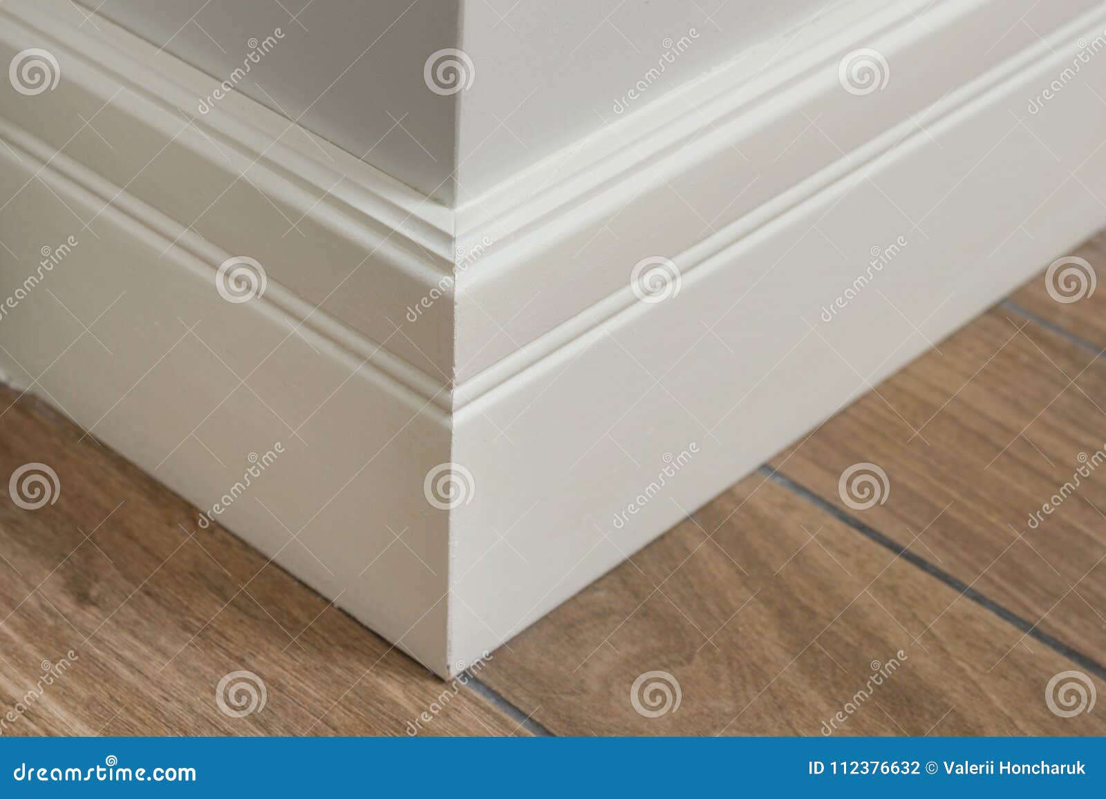 Molding in the Interior, Baseboard Corner. Light Matte Wall with Tiles ...