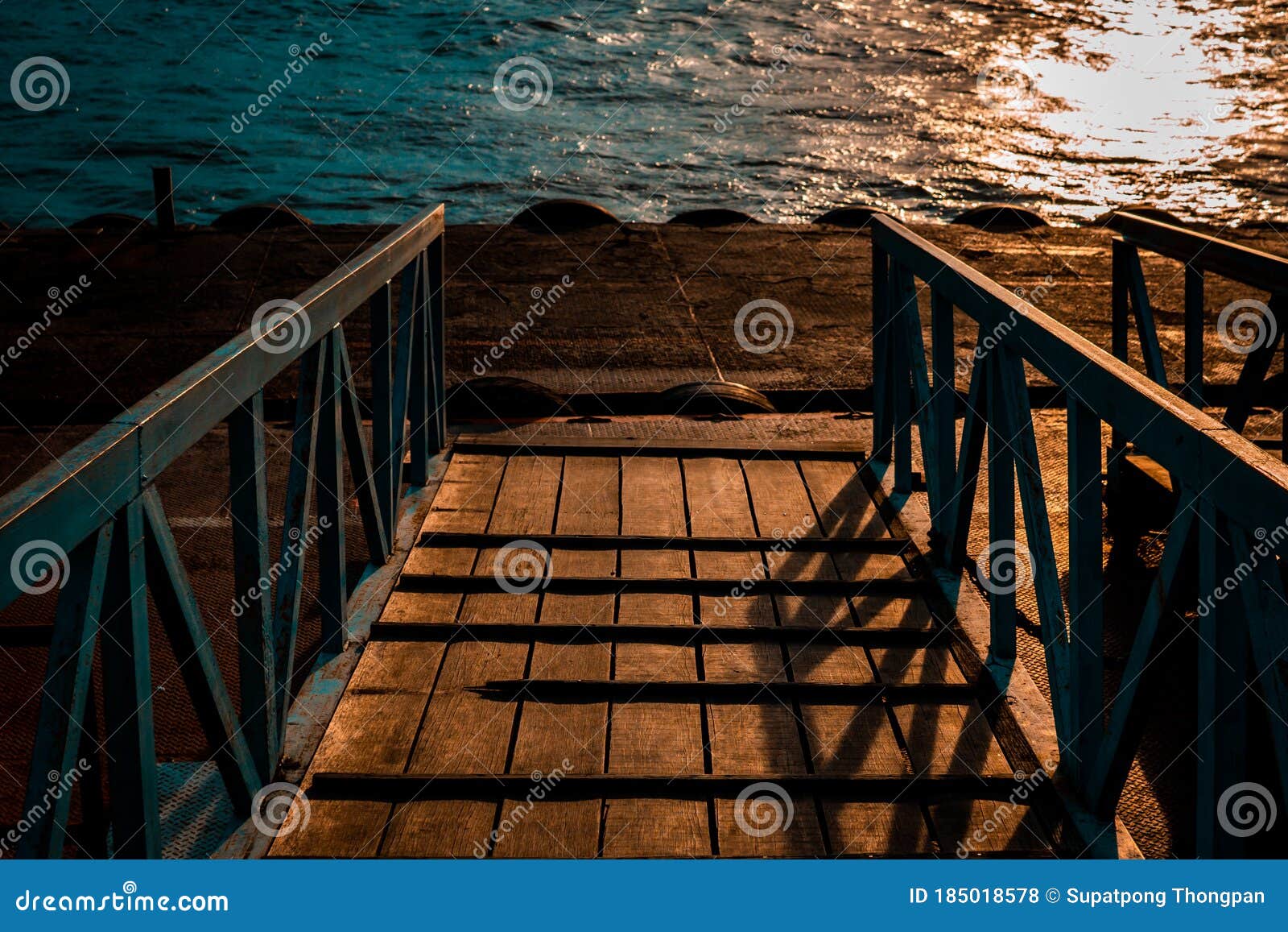 Mole Pier on the Lake. Wooden Bridge Stock Photo - Image of pier, water ...