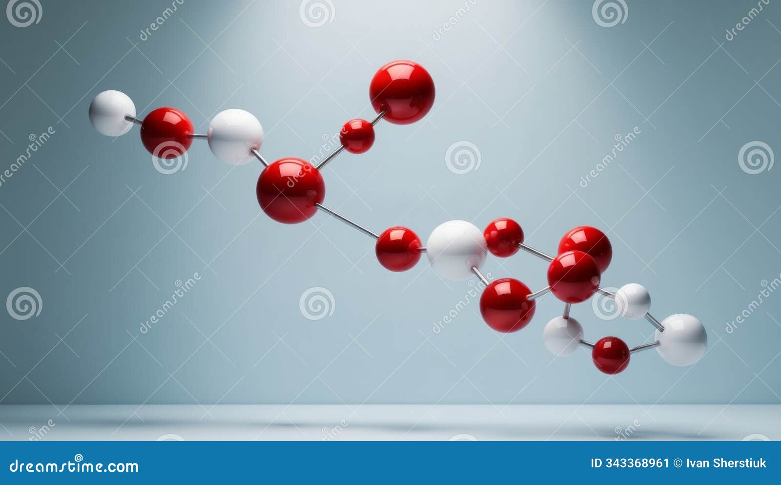 A Molecular Structure Model with Red and White Spheres on a Light Blue ...