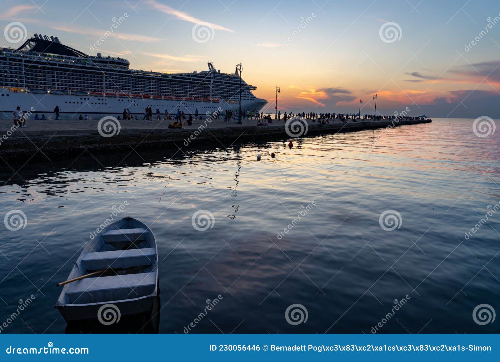 Molo Audace and a Cruise Ship in Trieste with a Boat in Sunset ...
