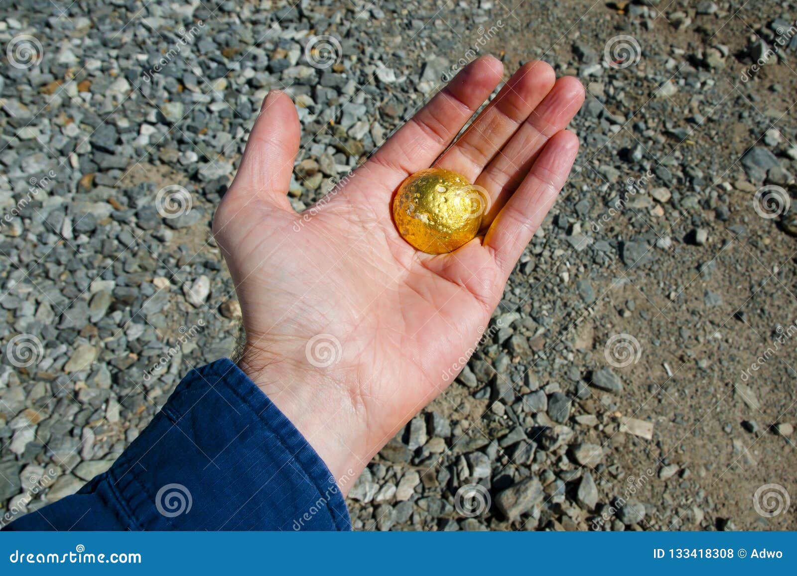 Molten Gold Nugget stock photo. Image of treasure, yellow - 133418308
