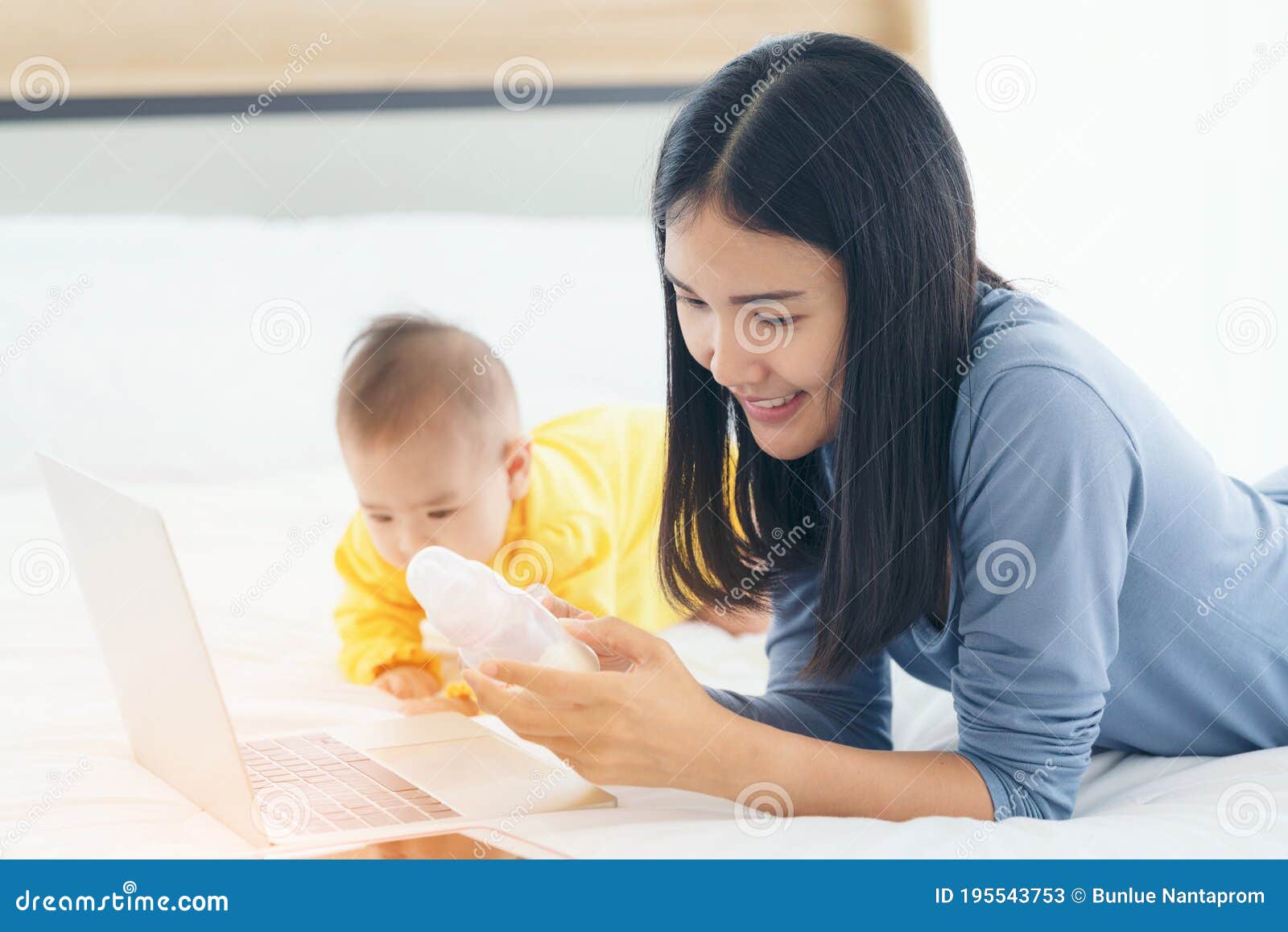 Mom and Baby with Laptop Computer Working from Home Stock Image - Image ...