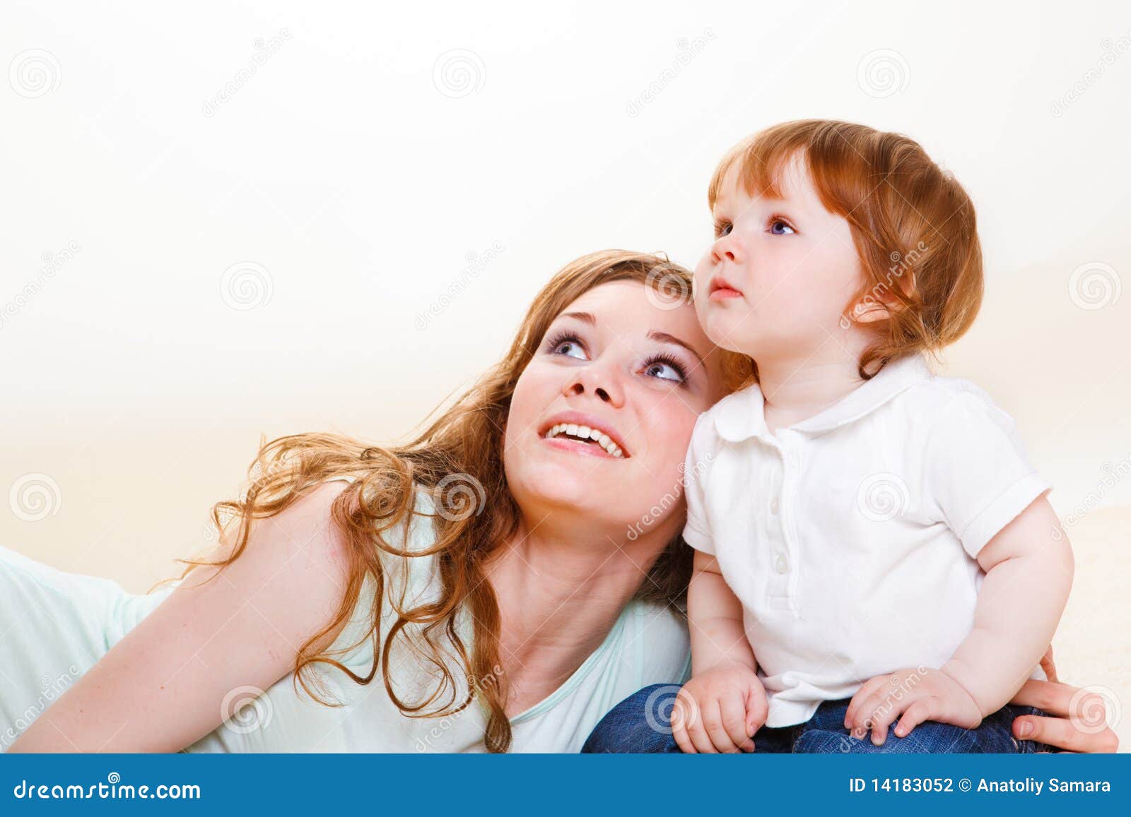 Mom and baby looking up stock photo. Image of childhood - 14183052