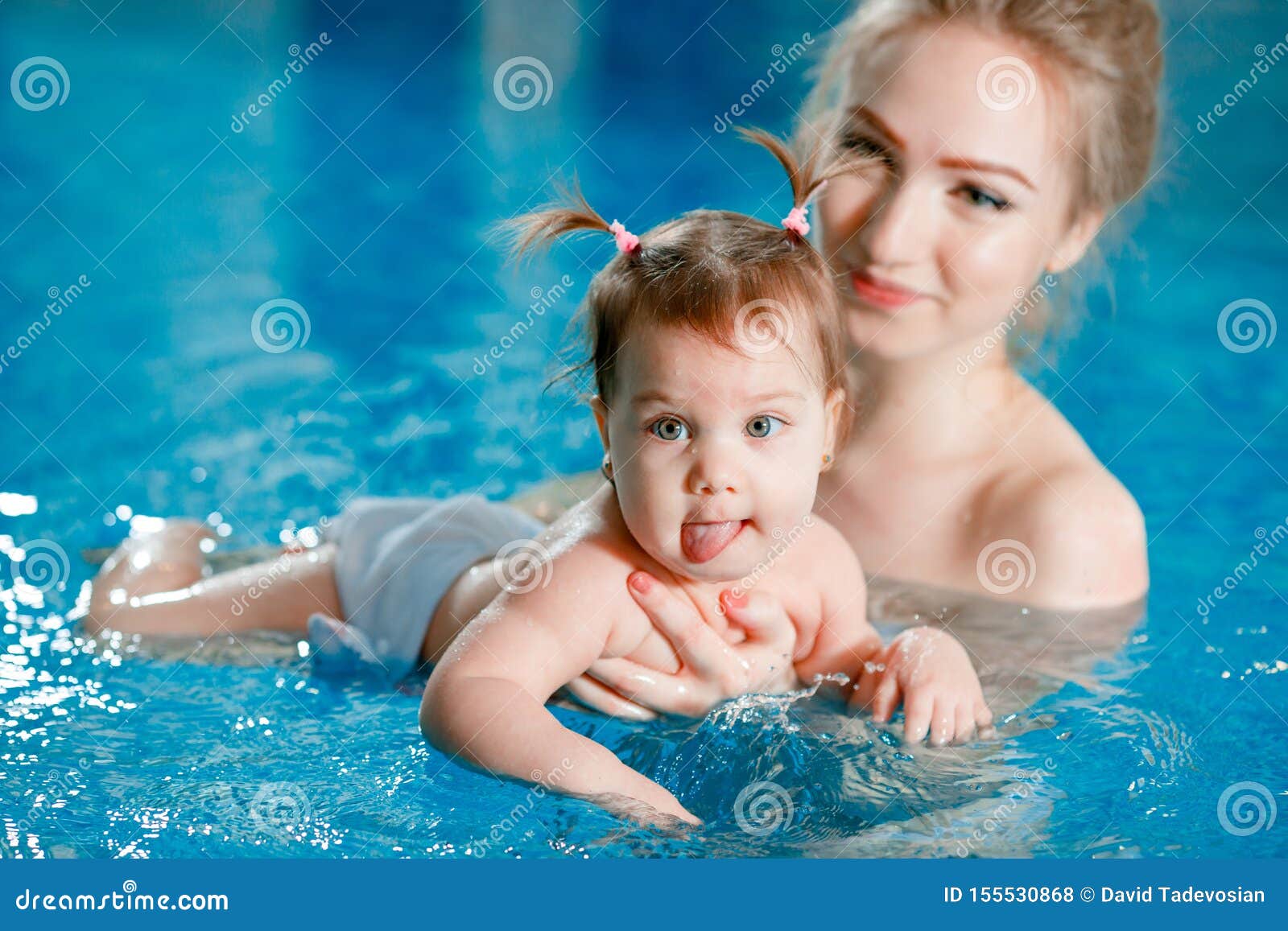 Mom and Baby Swim in the Pool. Stock Photo - Image of lesson, baby ...