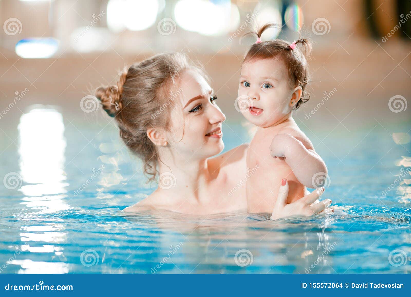 Mom and Baby Swim in the Pool. Stock Photo - Image of care, daughter ...