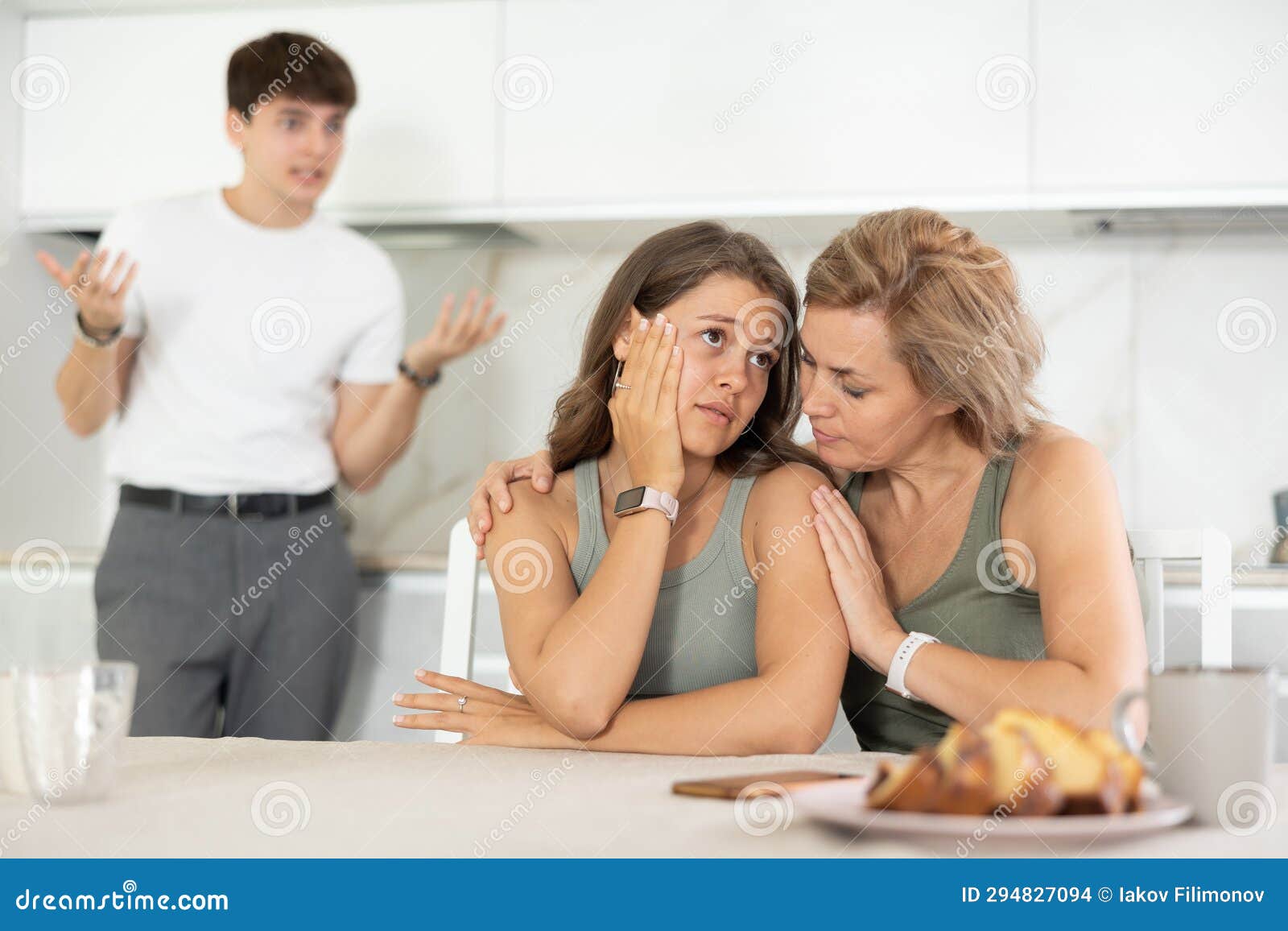 Mom Calms Her Daughter Down During Domestic Quarrel With Her Young