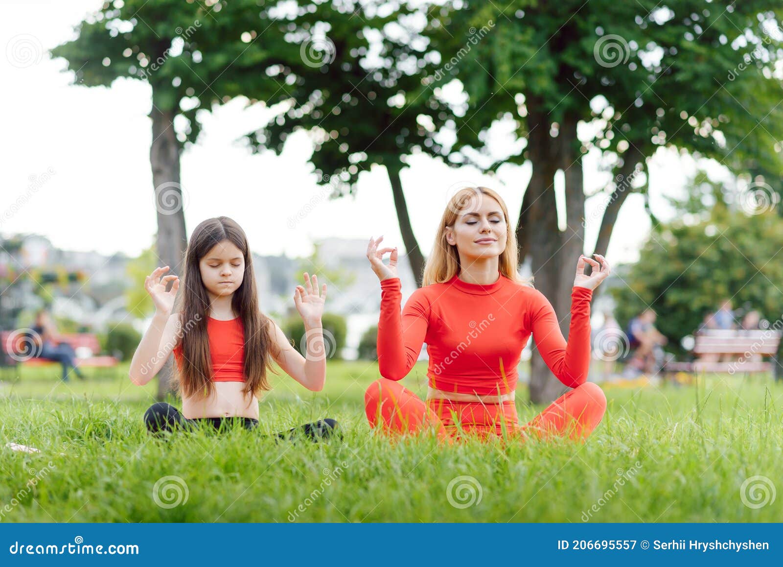 Mom and Child in the Lotus Position on the Nature Stock Image - Image ...