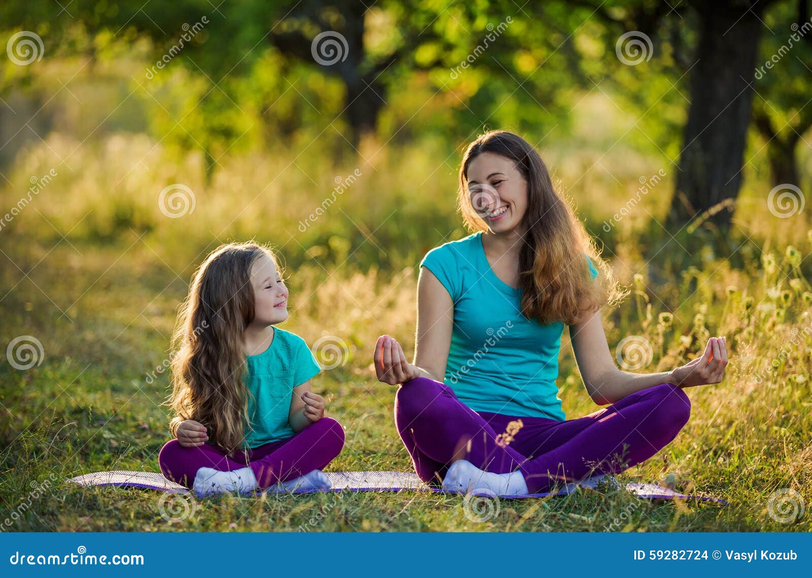Mom and Child in the Lotus Position Stock Photo - Image of parent ...