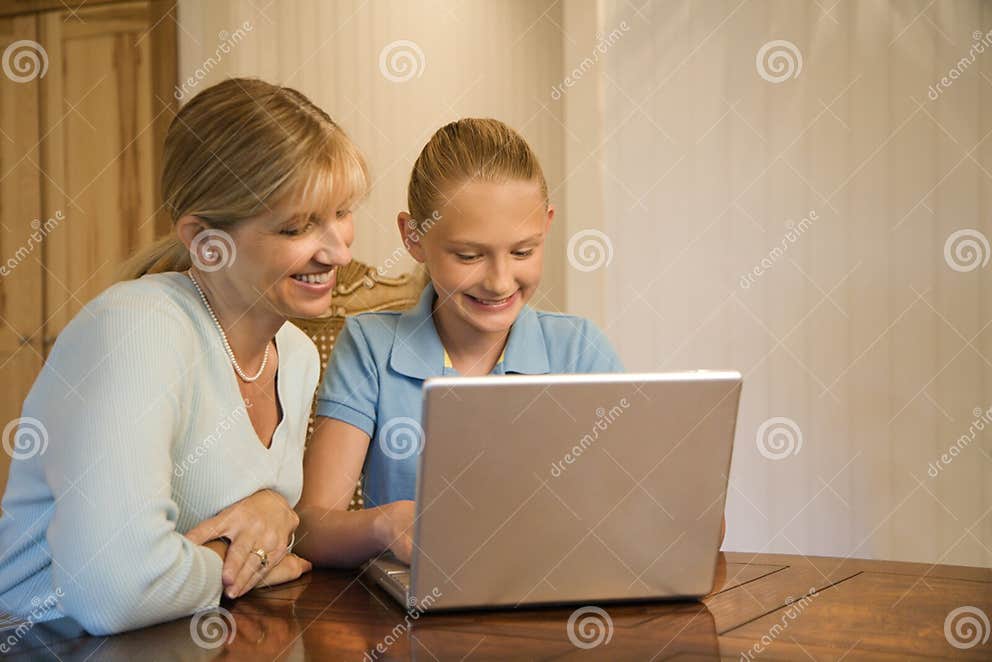 Mom and Daughter with Computer Stock Image - Image of routine ...