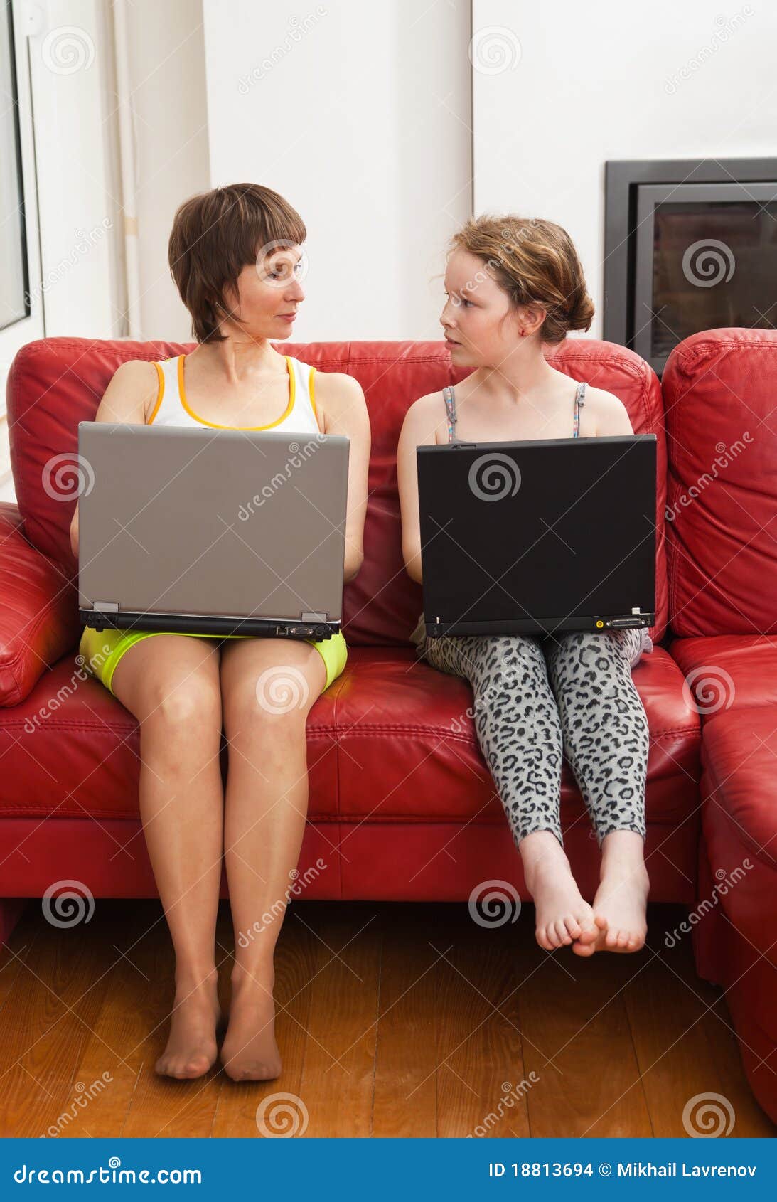 Mom and Daughter with Computers Stock Photo - Image of computer, seated ...