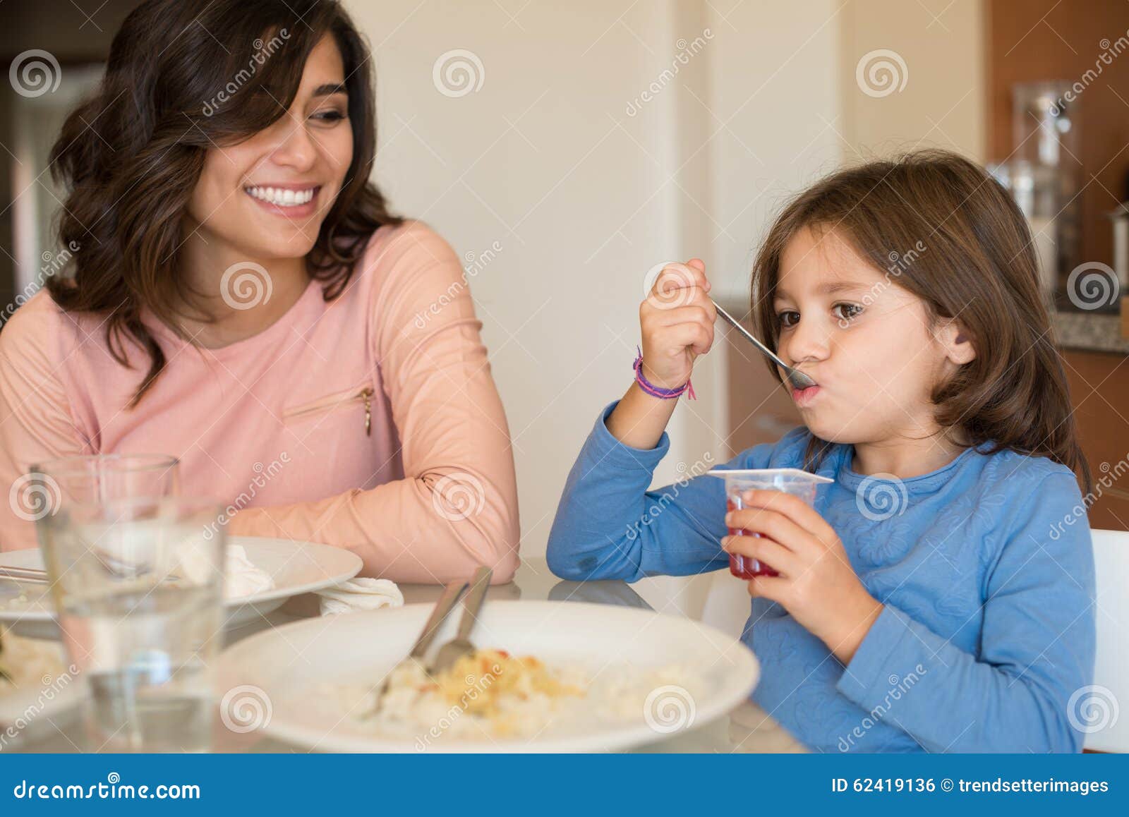 Mom and Daughter Having Lunch Stock Photo - Image of lunch, home: 62419136