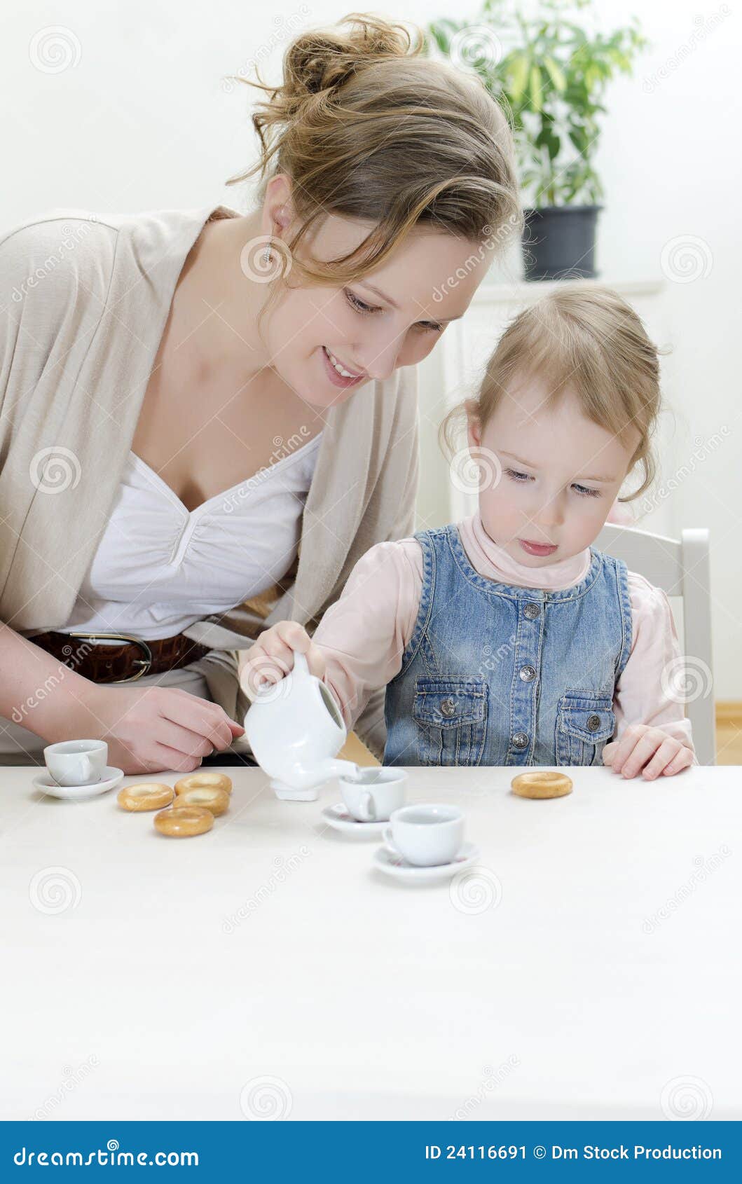Mom and Daughter Having Tea Stock Image - Image of children, teapot ...