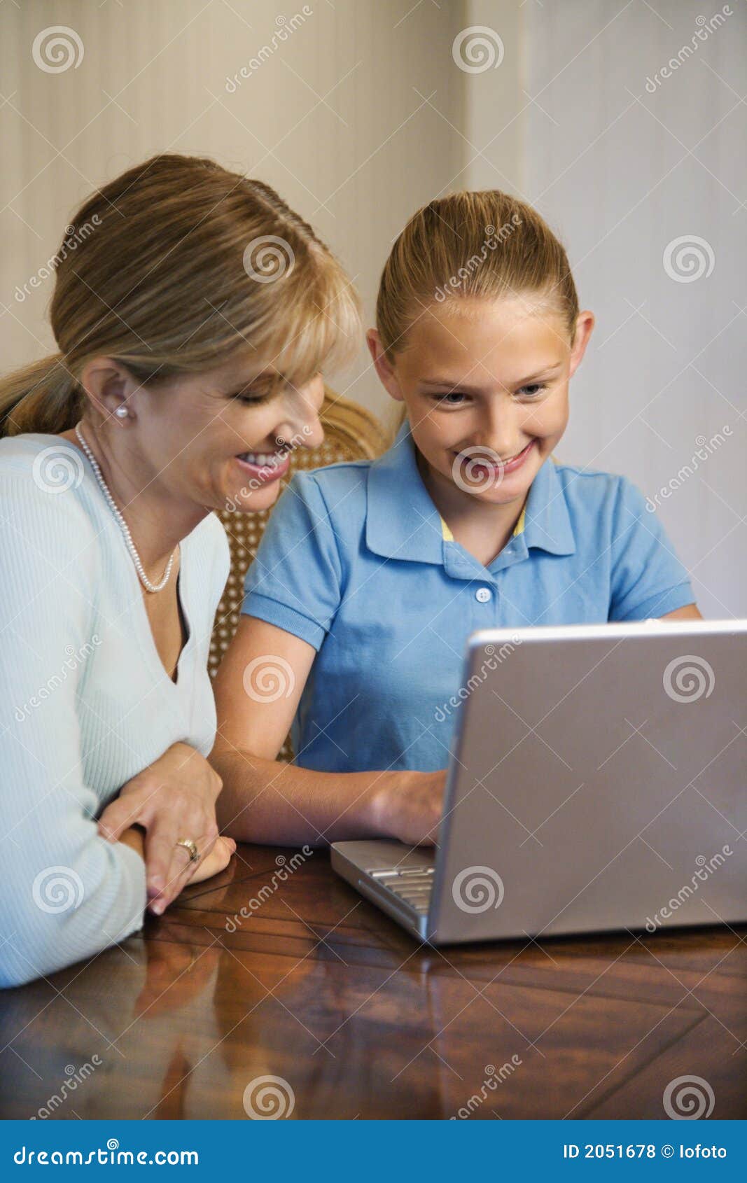 Mom and daughter on laptop stock photo. Image of everyday - 2051678