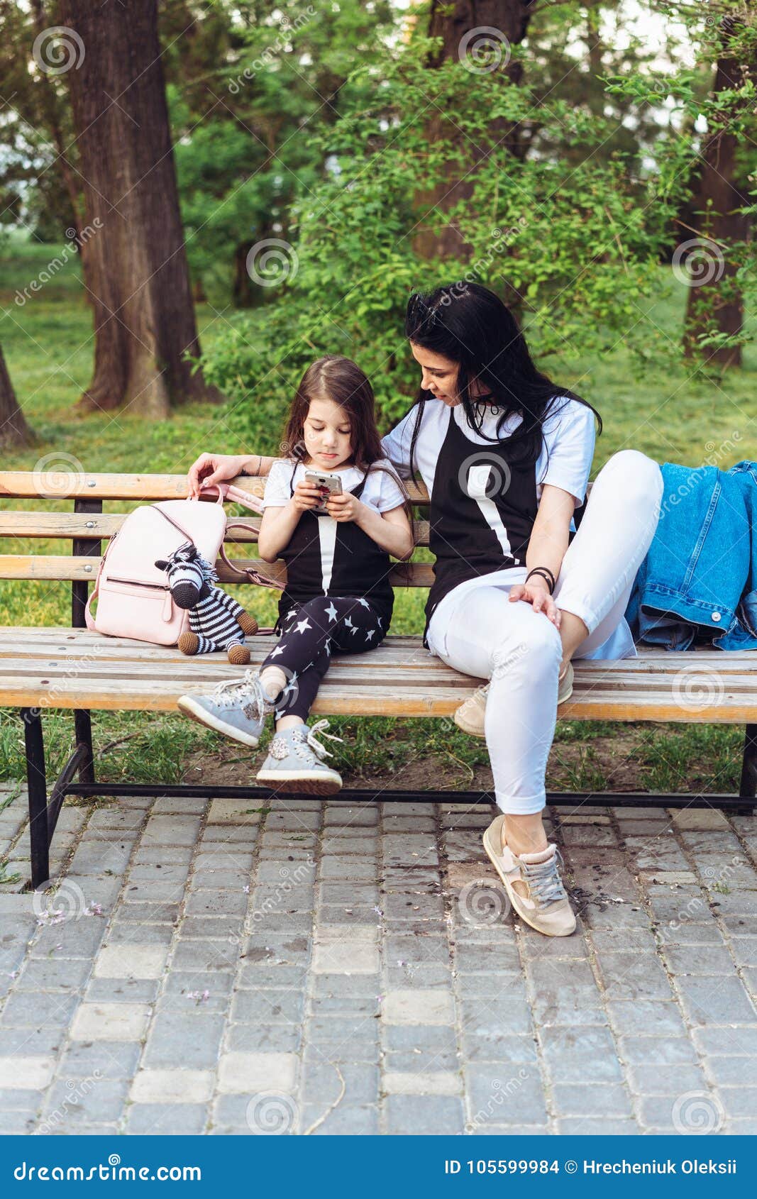 Mom and Daughter Rest on the Bench Stock Photo - Image of active ...