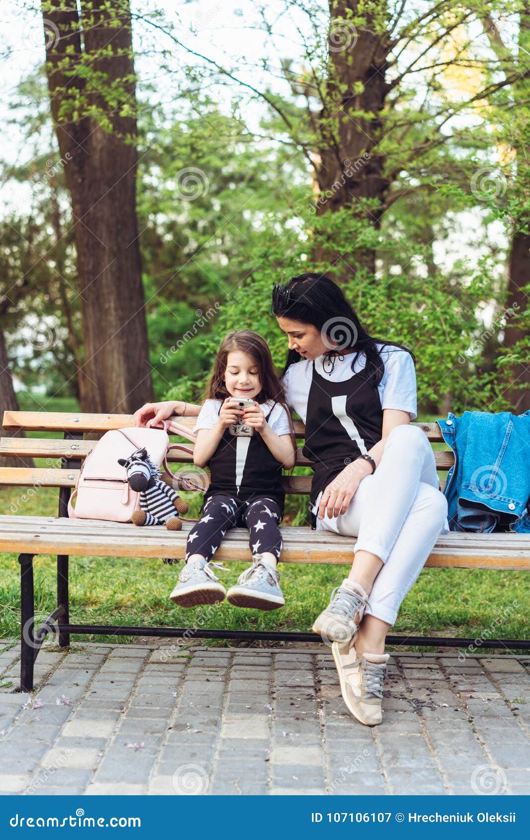 Mom and Daughter Rest on the Bench Stock Image - Image of playful ...