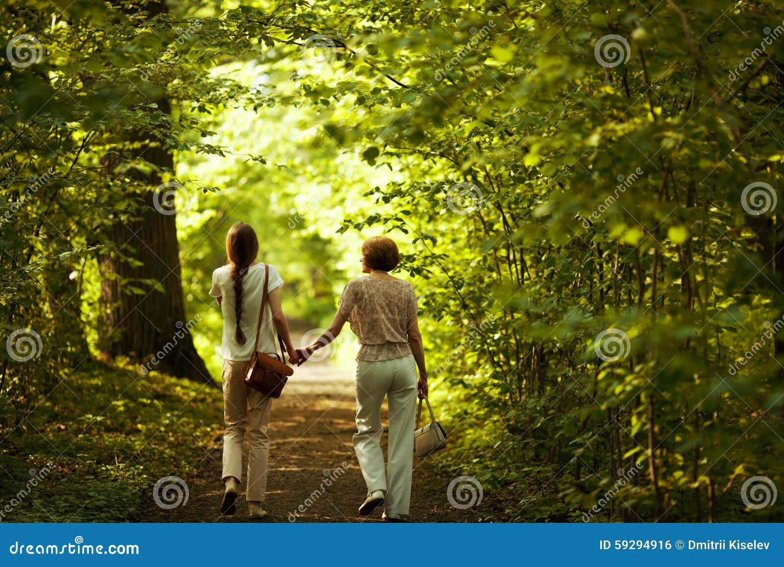 Mom and Daughter Walking in the Park Stock Photo - Image of fondness ...