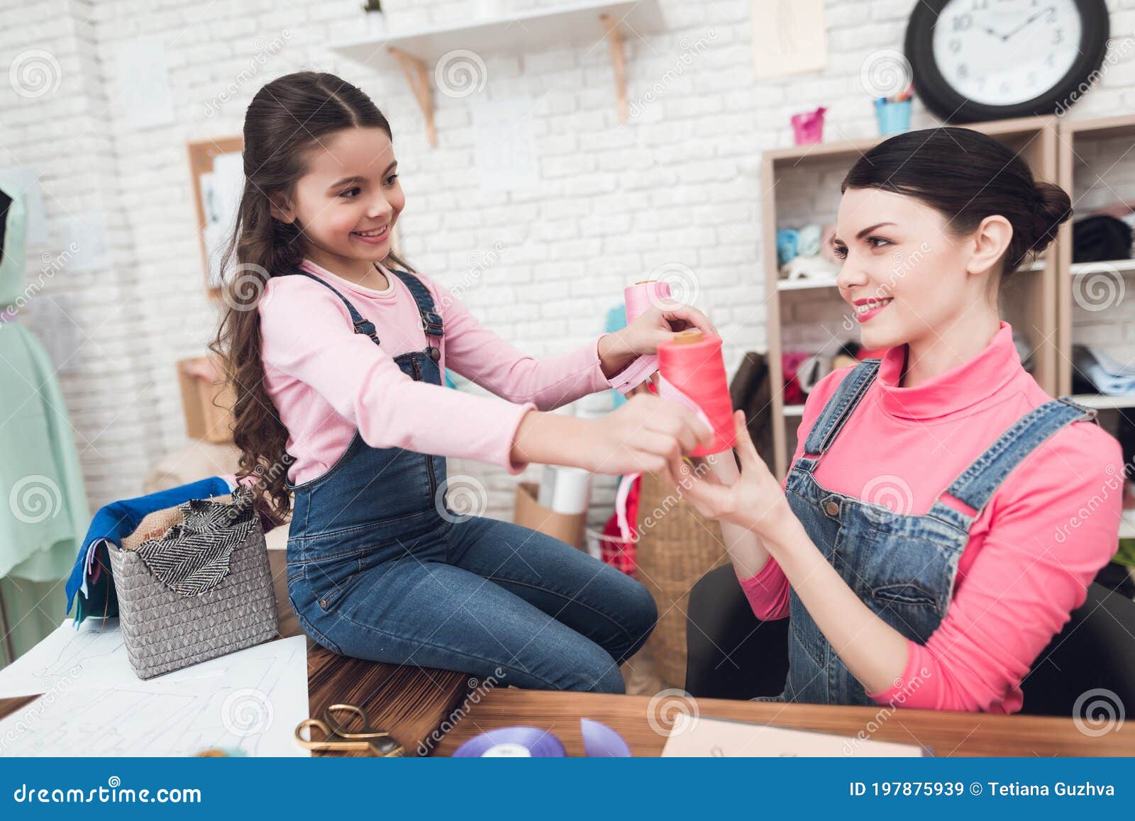 Mom and Daughter Work Together in Sewing Workshop. Stock Image - Image ...
